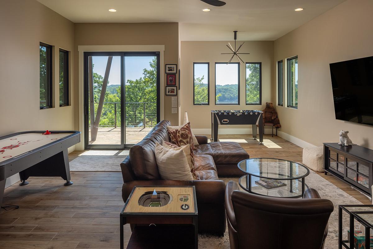 We call it the 'Fun Room' - It's a lower-level family room that opens ...